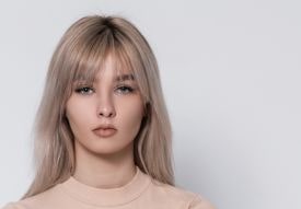 Q&A: How To Cut And Style 70s Style Curtain Bangs